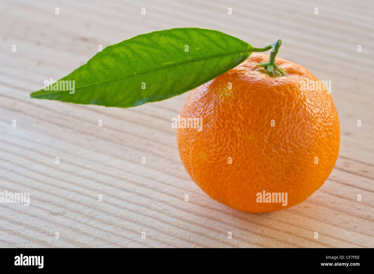 Beautiful orange in wood background with great colors Stock Photo - Alamy
