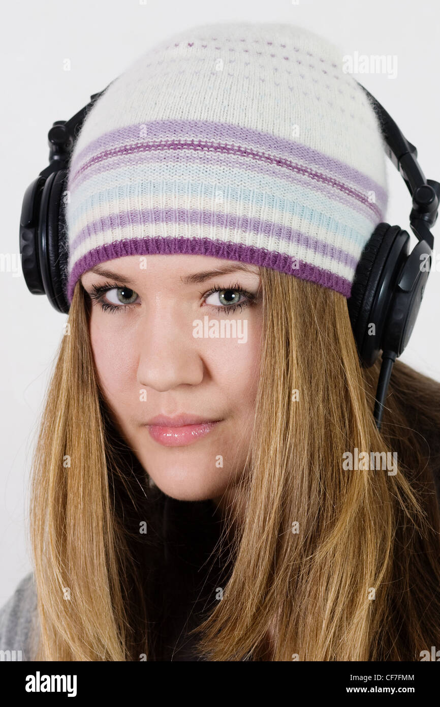 attractive disc jockey girl wearing stereo headset Stock Photo - Alamy