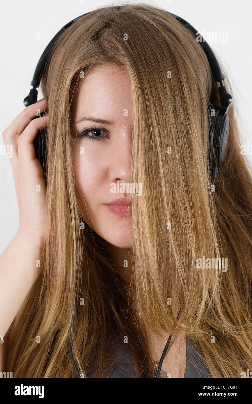 Attractive blond chick staring at you Stock Photo - Alamy