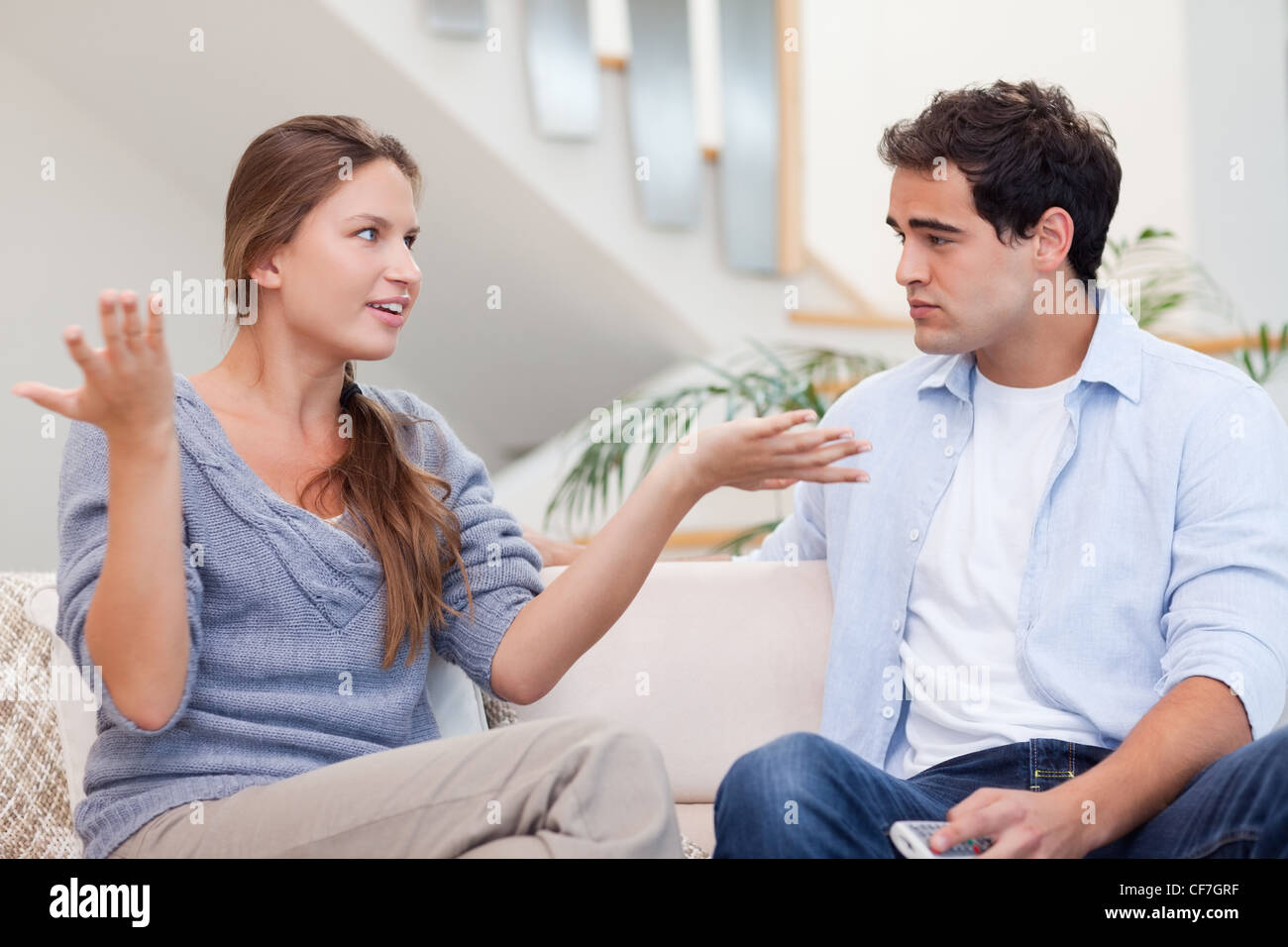 Couple tv argue hi-res stock photography and images - Alamy