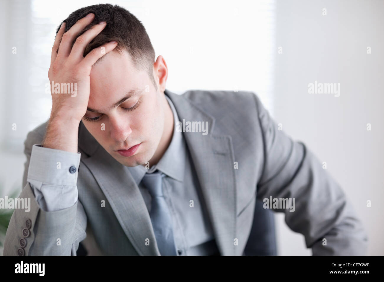 Close up of businessman after getting bad news Stock Photo - Alamy