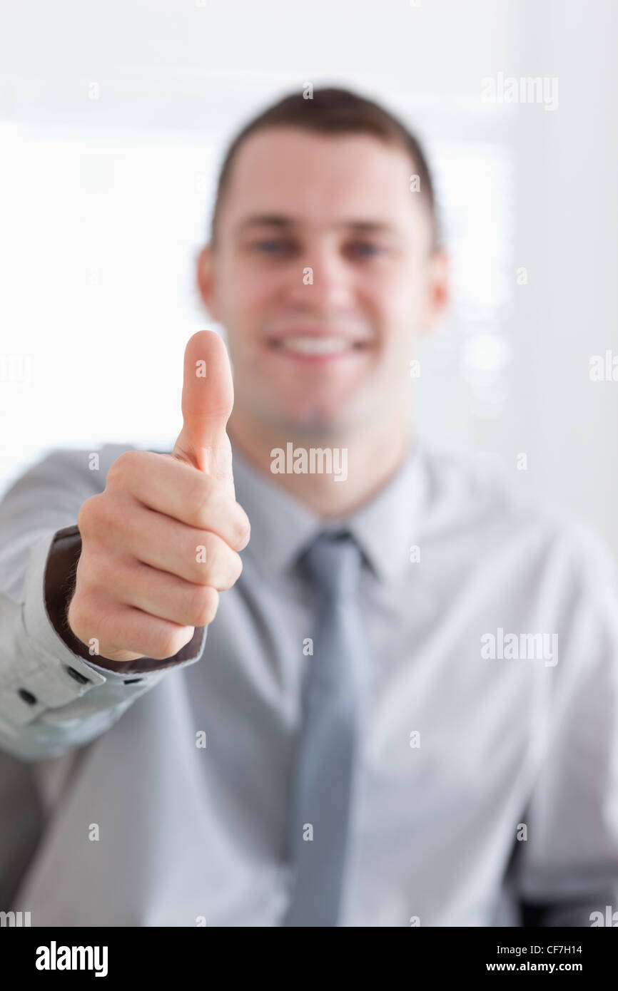 Close up of giving thumbs up Stock Photo - Alamy