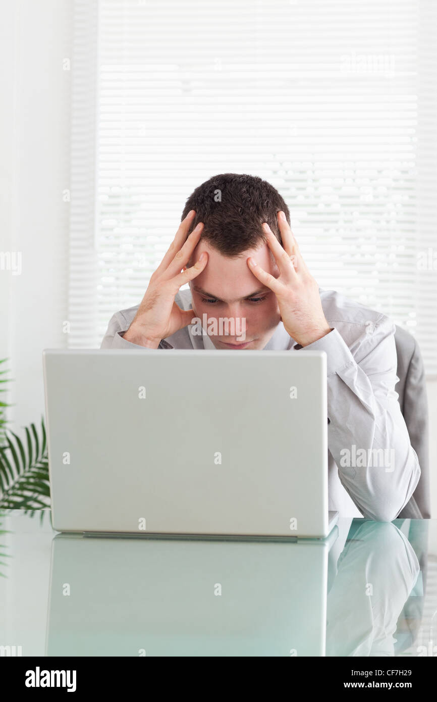 Close up of businessman getting bad news via email Stock Photo - Alamy