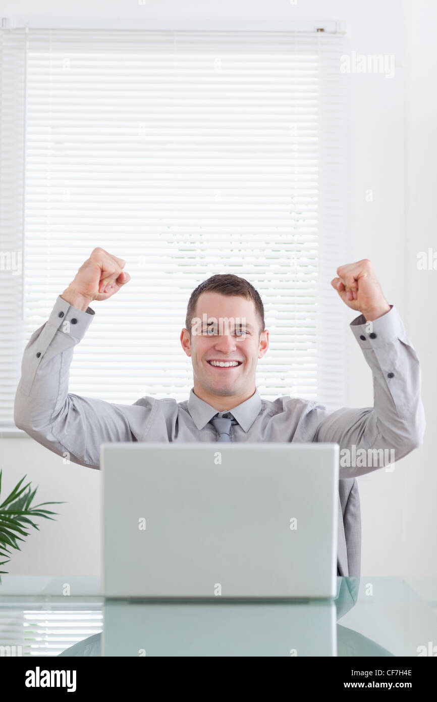 Businessman celebrating a great success Stock Photo - Alamy