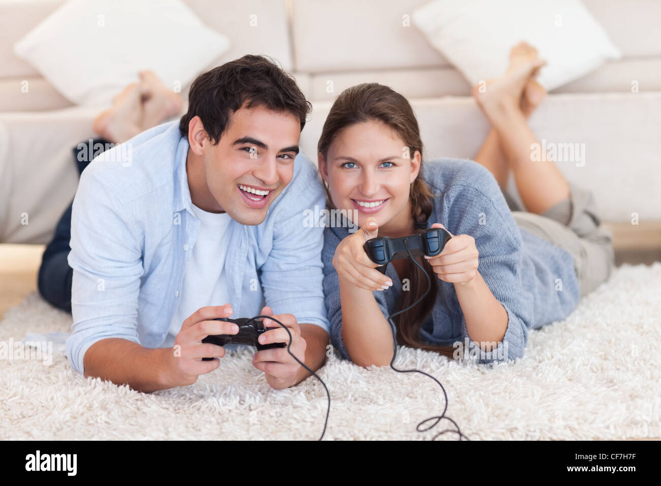 In love couple playing video games Stock Photo - Alamy