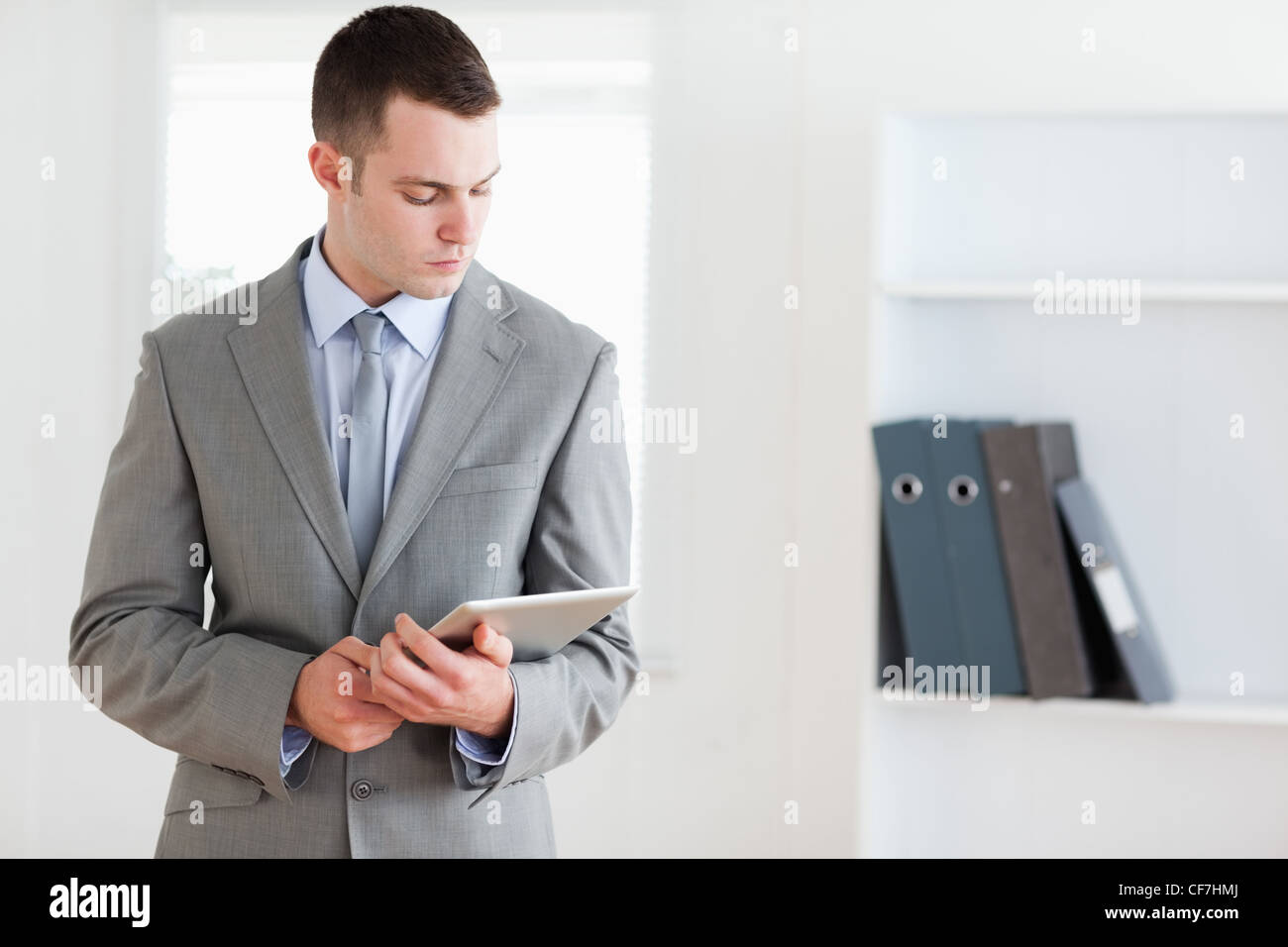 Businessman checking his notes Stock Photo - Alamy