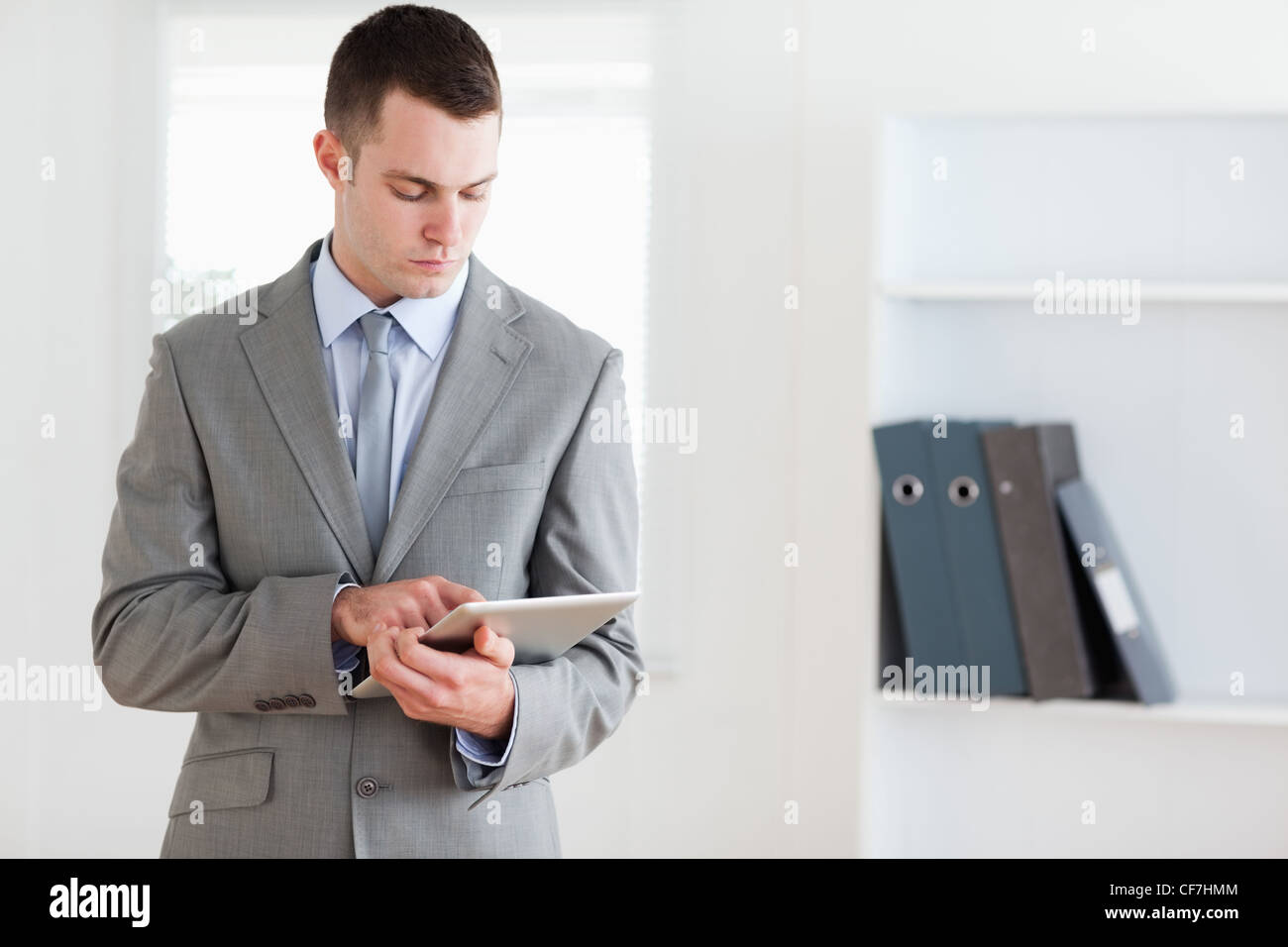 Businessman reading his notes Stock Photo - Alamy
