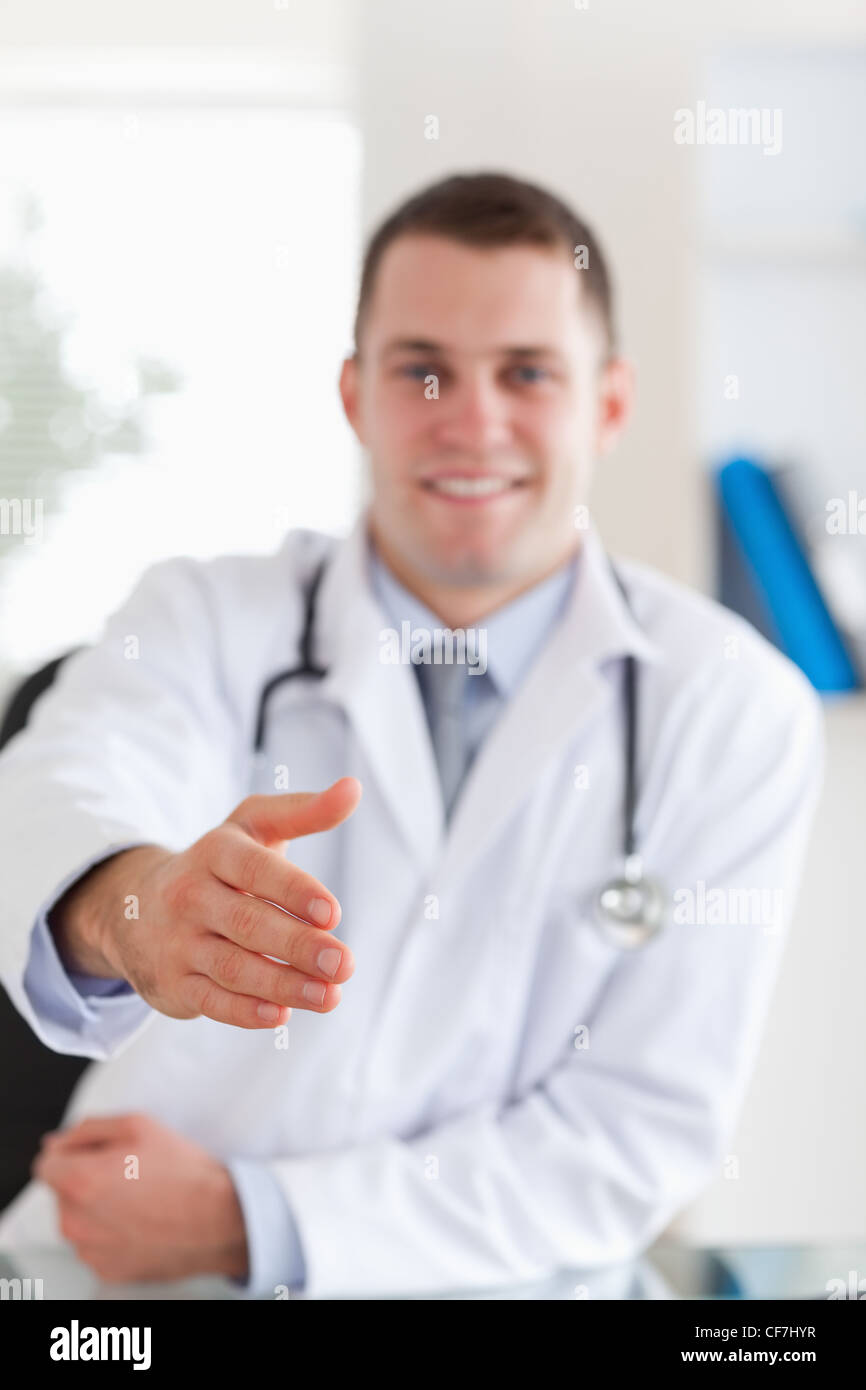 Doctor offering his hand Stock Photo - Alamy Doctor offering his hand Stock Photo - Alamy