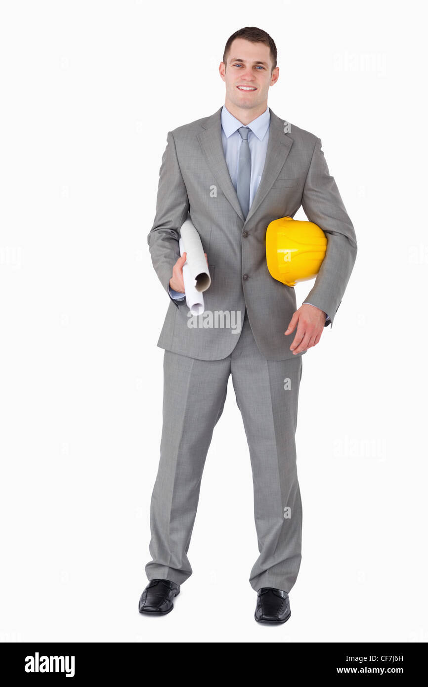 Male architect working blueprints Cut Out Stock Images & Pictures - Alamy