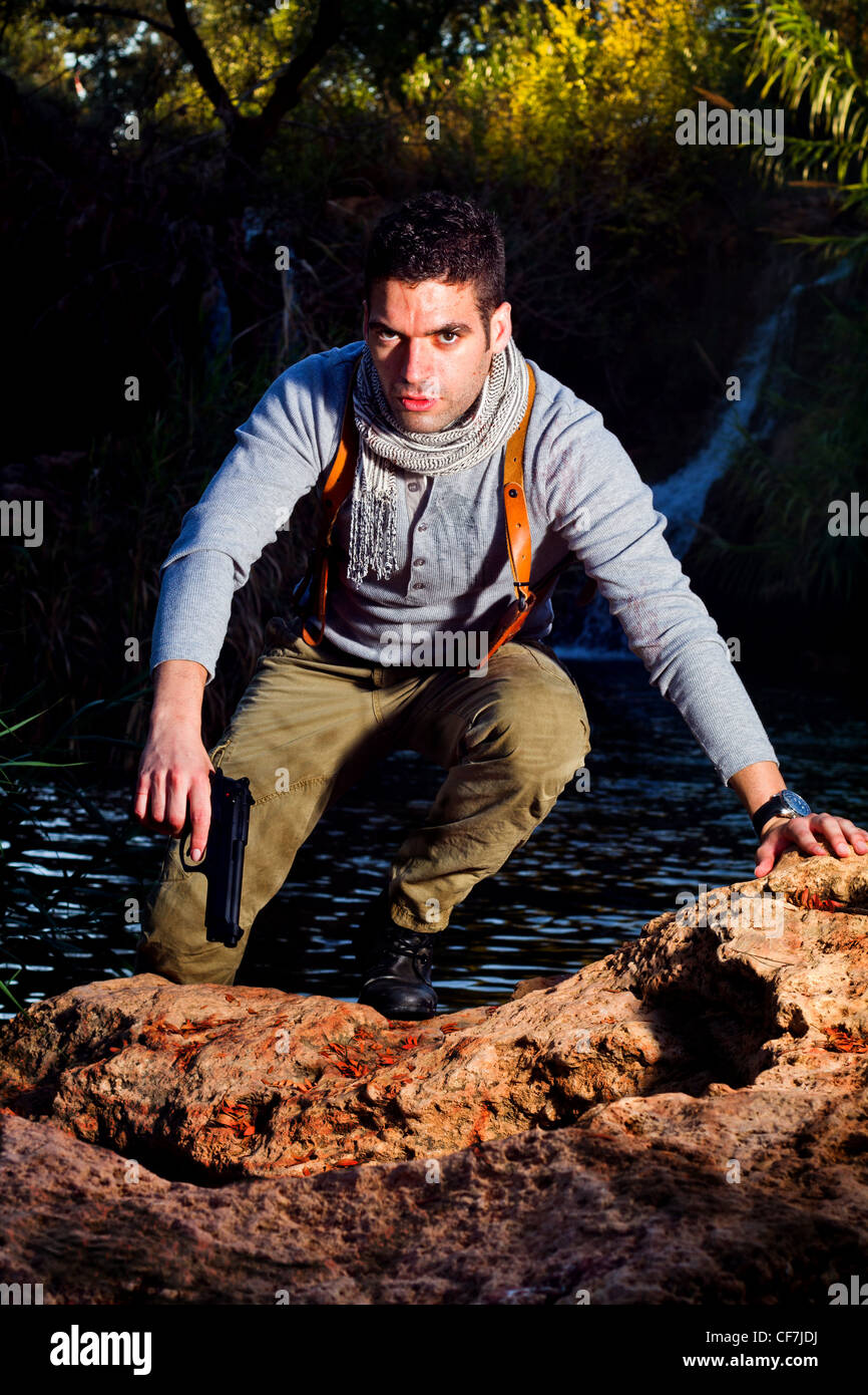 View of an treasure hunter, jungle adventurer type man Stock Photo - Alamy