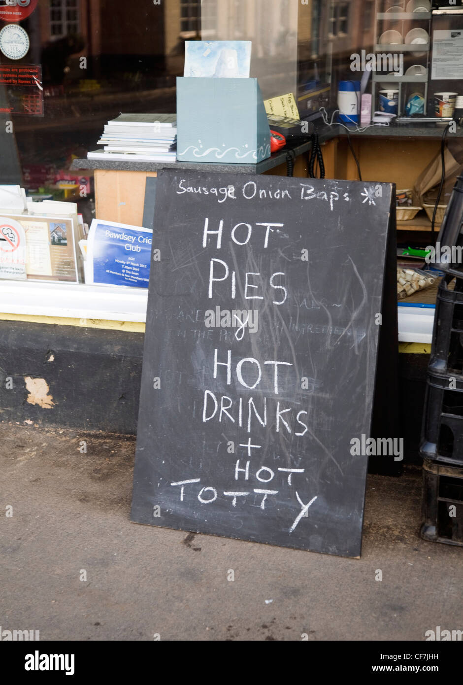 Funny sign outside shop Hot pies, drink and hot totty Stock Photo - Alamy