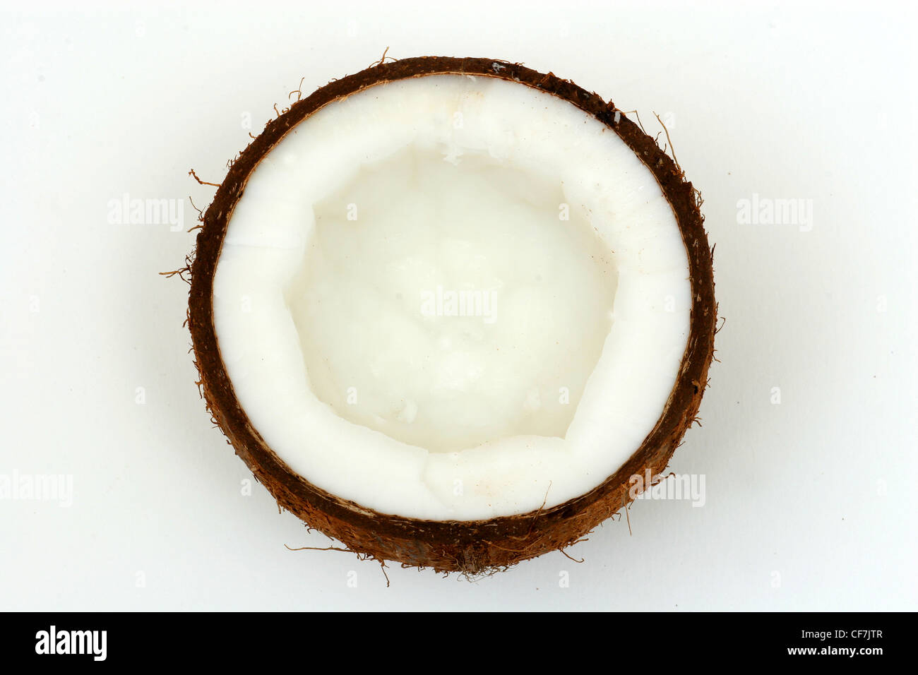 A cut out of half a coconut Stock Photo - Alamy