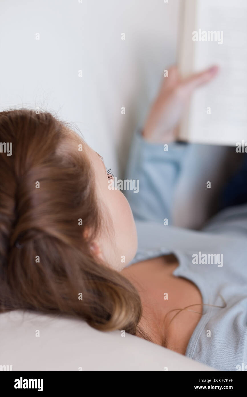 Shadowing woman who is reading Stock Photo - Alamy