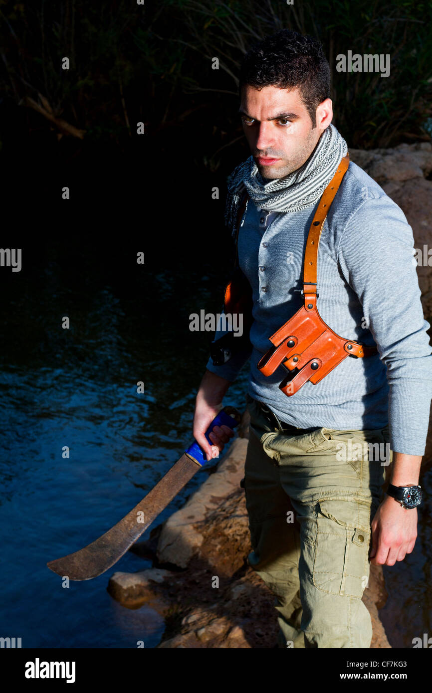 View of an treasure hunter, jungle adventurer type man Stock Photo - Alamy