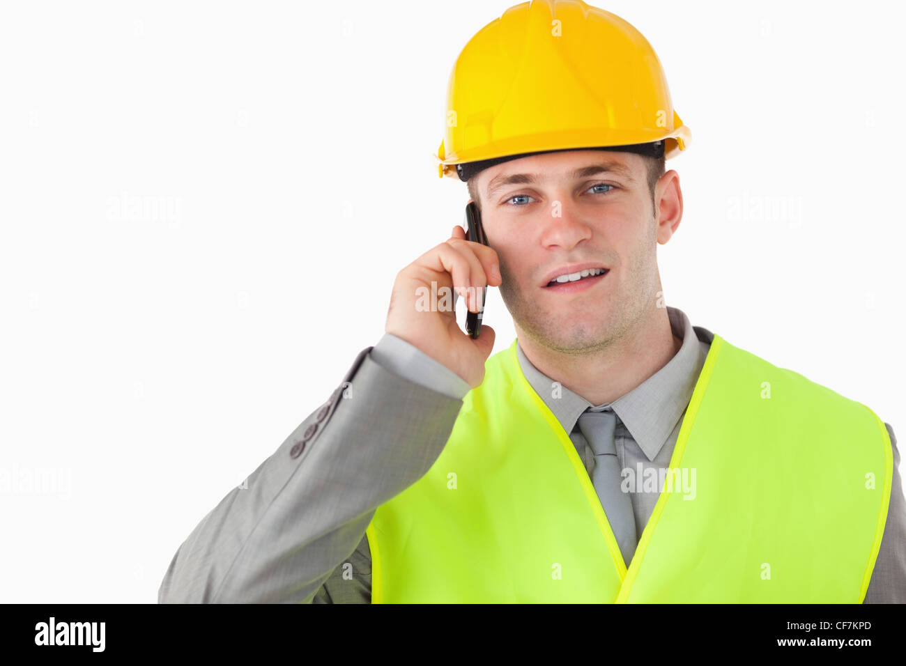 Builder using his cellphone Stock Photo - Alamy