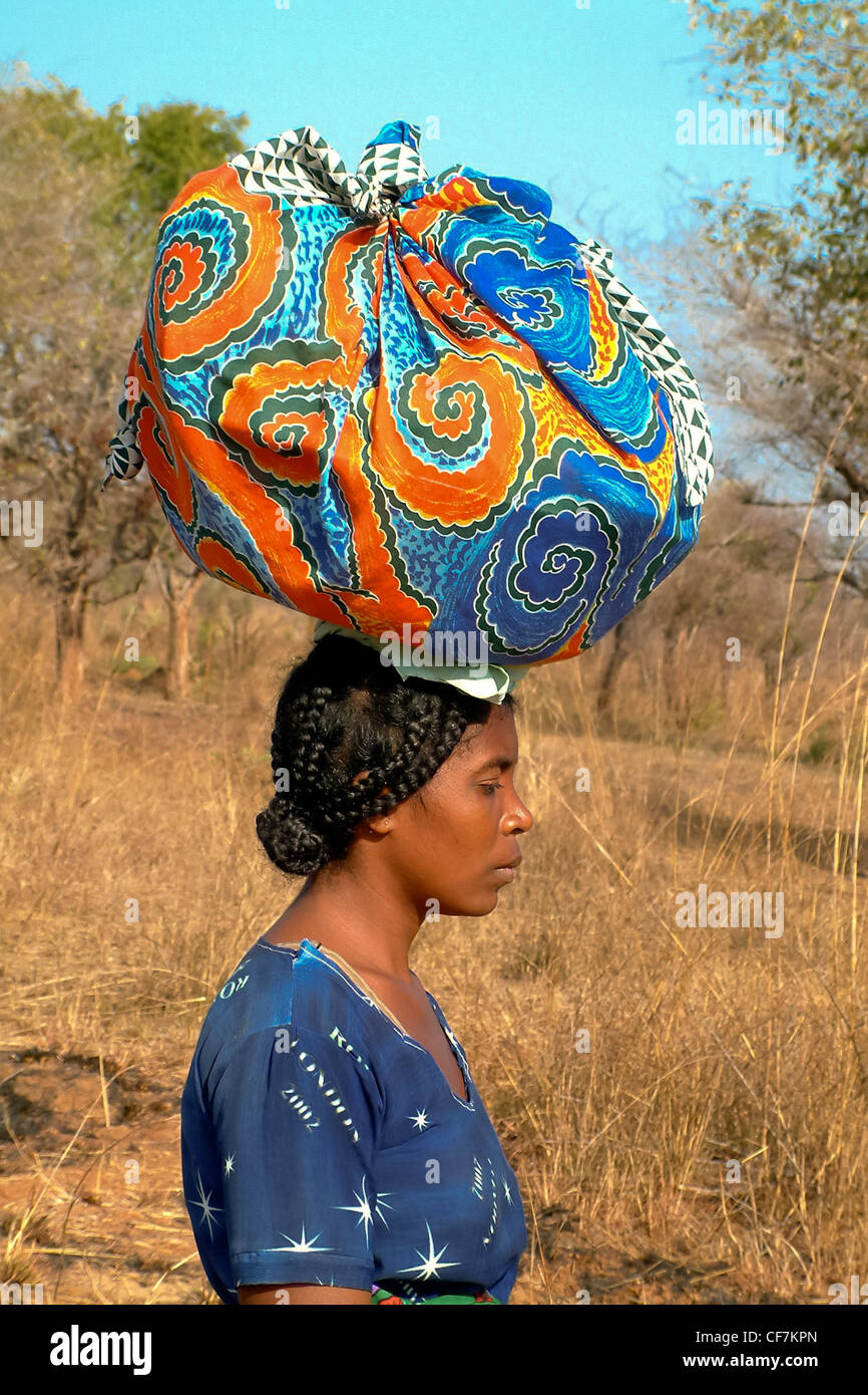 Sakalava woman carrying objects on his head to Bekopaka, western ...