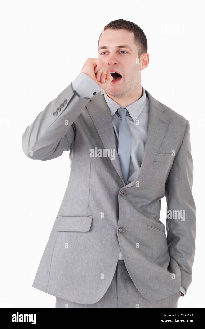 Portrait of a businessman yawning Stock Photo - Alamy