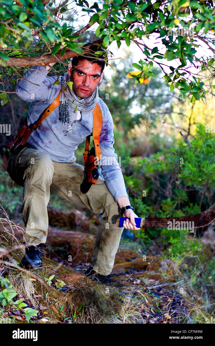 View of an treasure hunter, jungle adventurer type man Stock Photo - Alamy