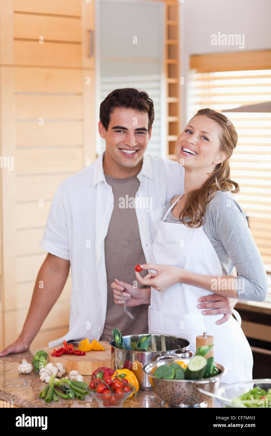 Couple cooking together Stock Photo - Alamy