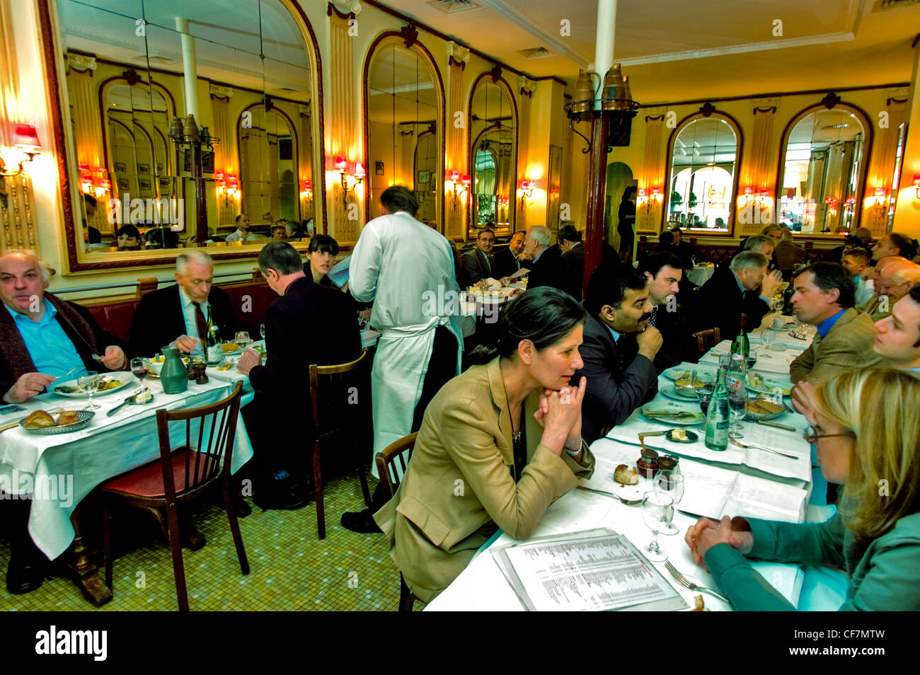 PARIS, France, - Adults Sharing Meals in Dining Room of Traditional ...
