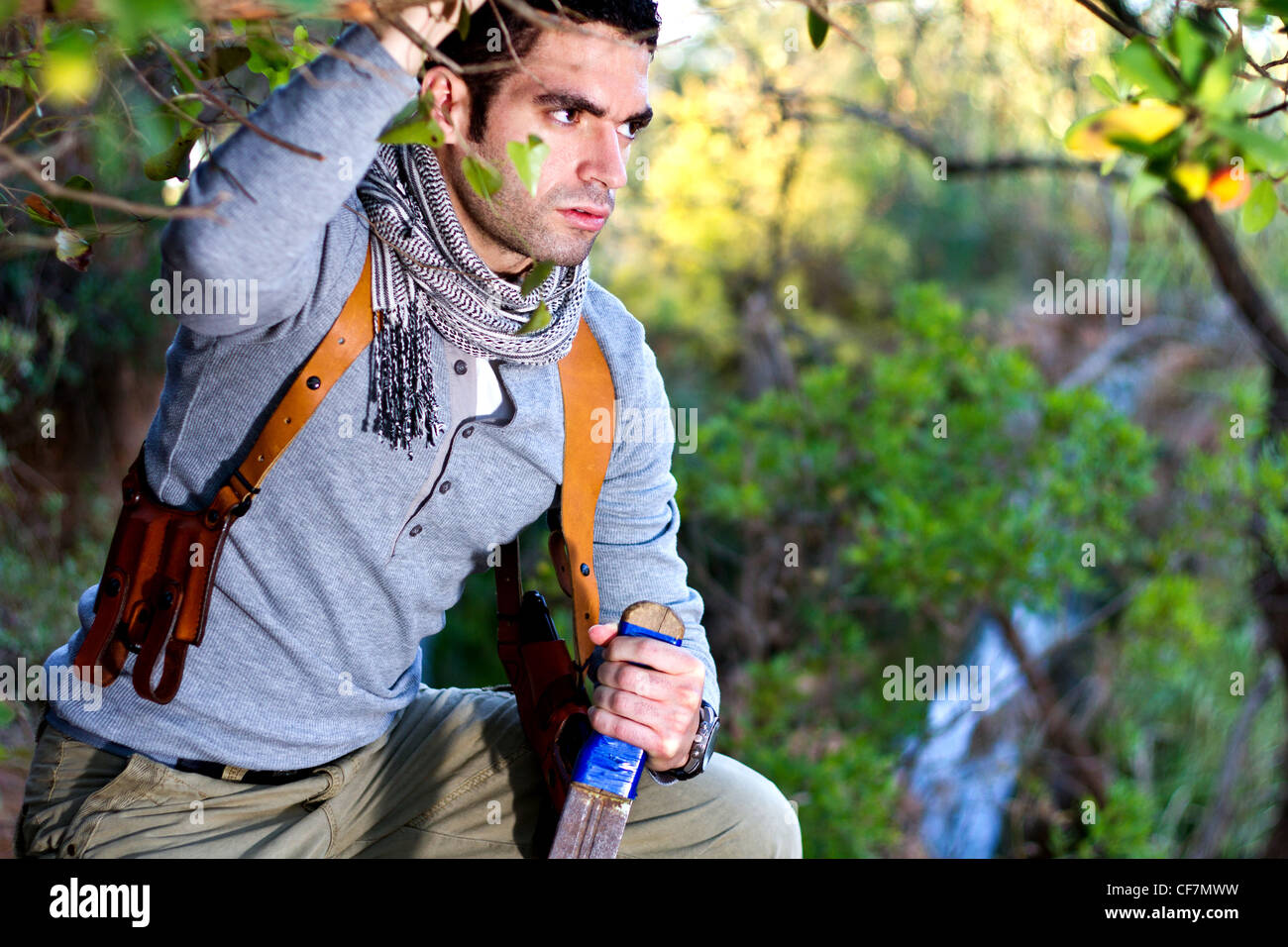 View of an treasure hunter, jungle adventurer type man Stock Photo - Alamy