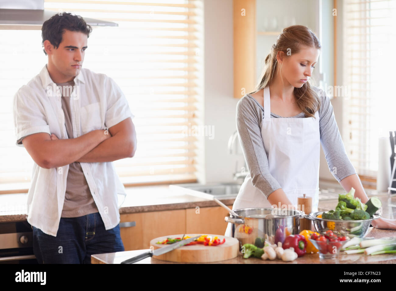 Cooking home woman watches hi-res stock photography and images - Alamy