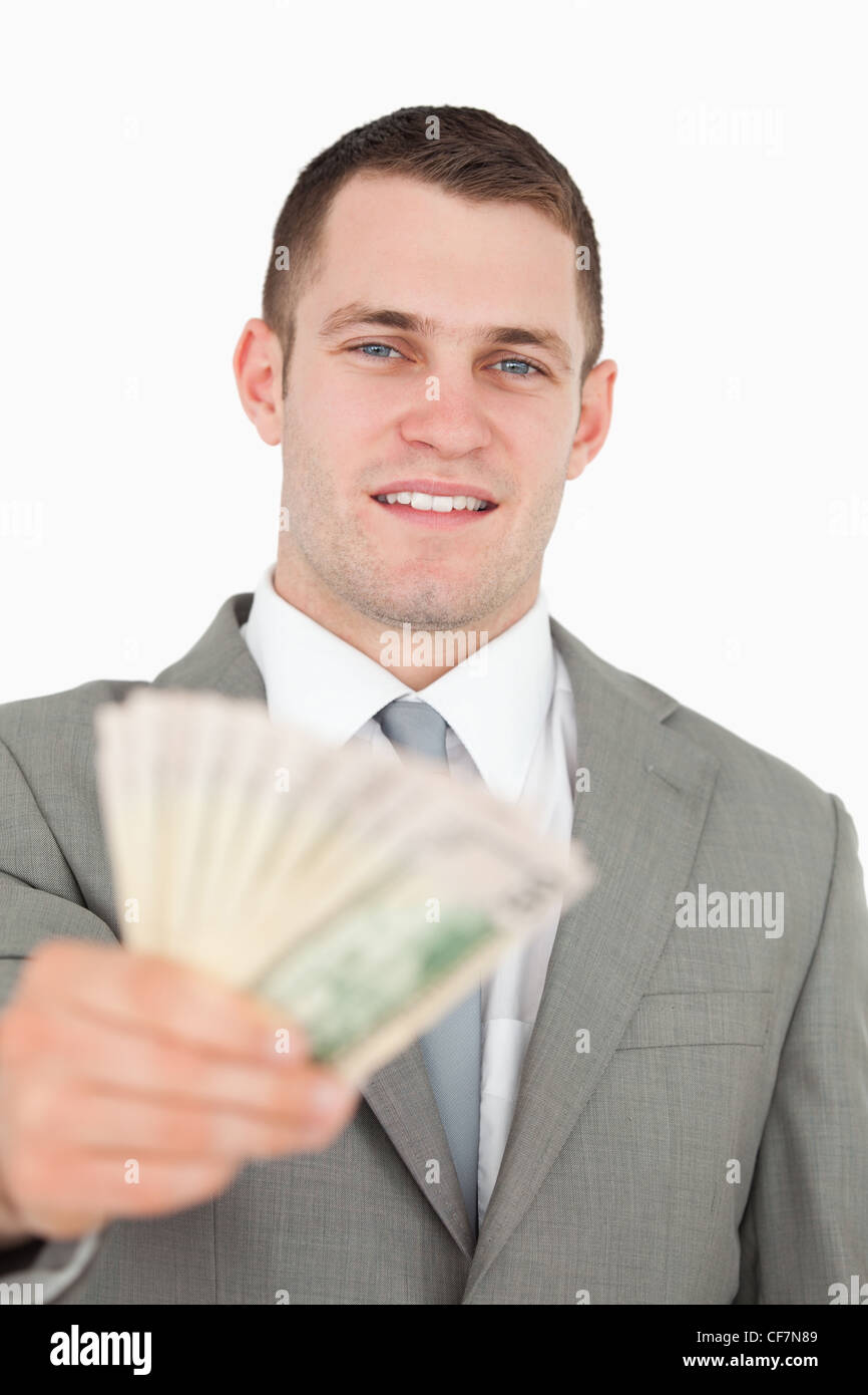Portrait of a businessman giving notes Stock Photo - Alamy