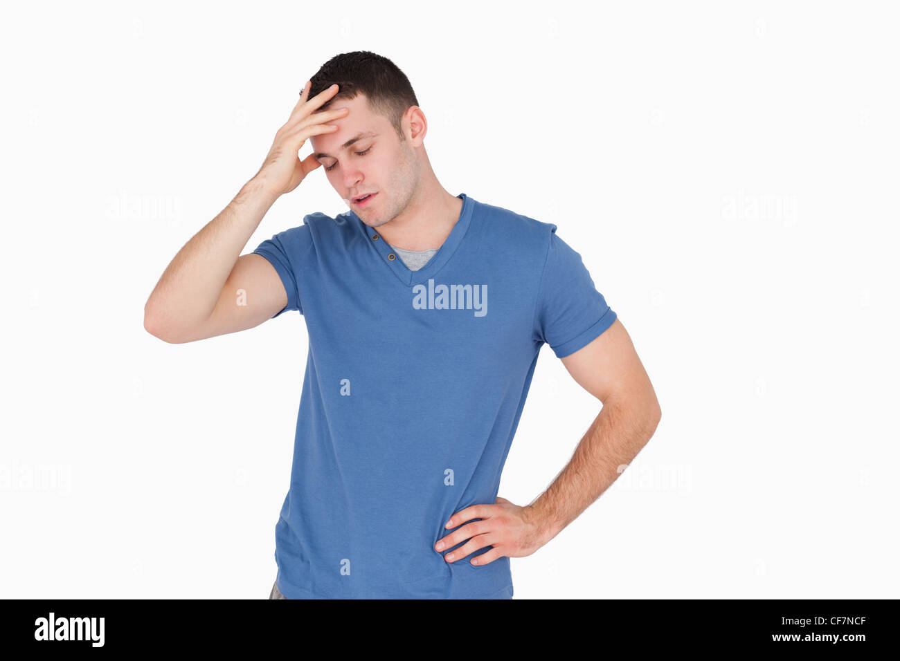 Tired young man Stock Photo - Alamy