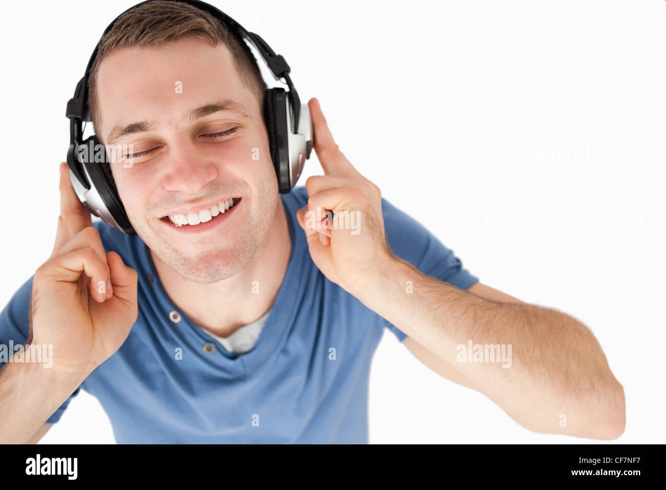 Happy man listening to music Stock Photo - Alamy