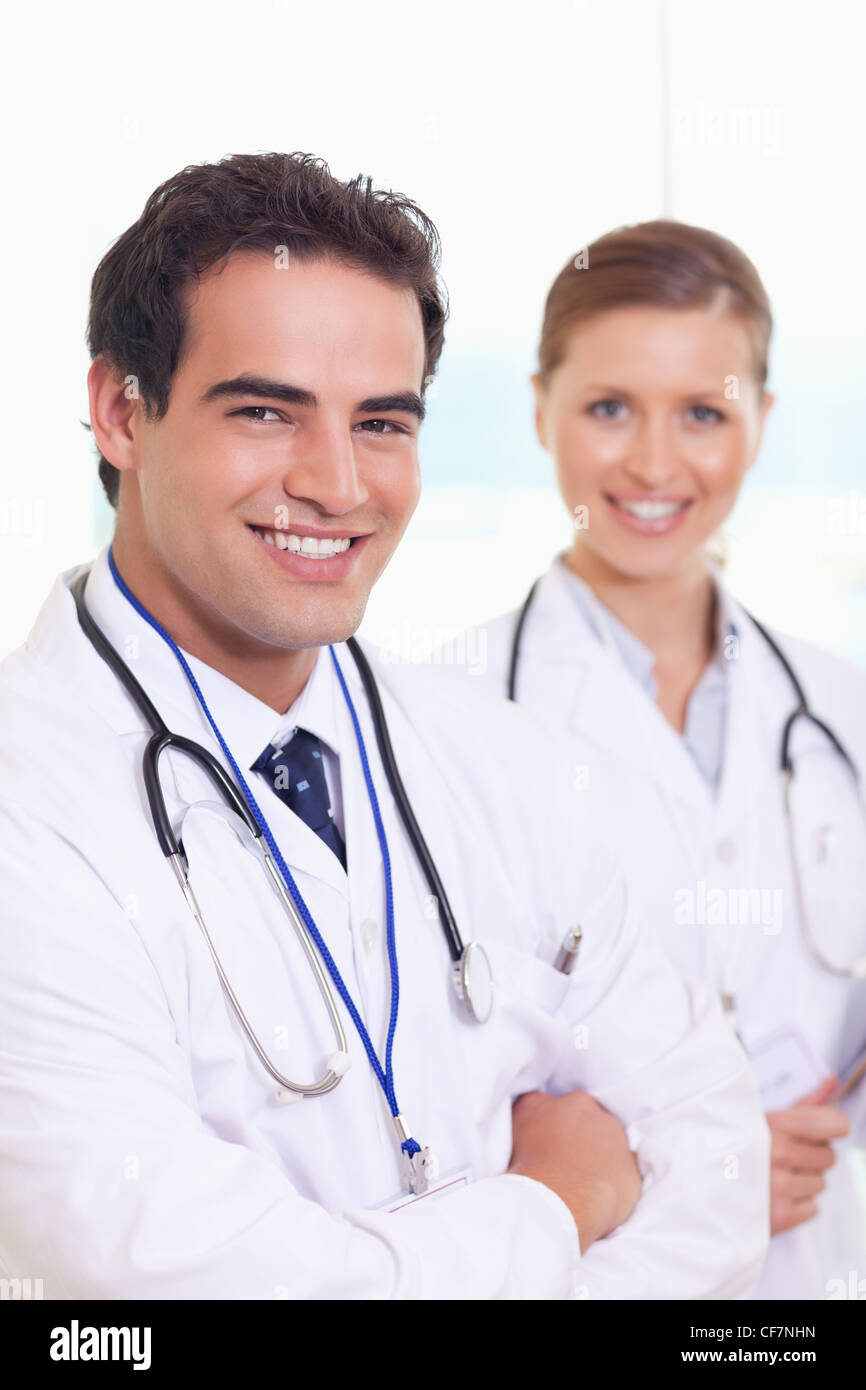 Smiling medical team standing next to each other Stock Photo - Alamy