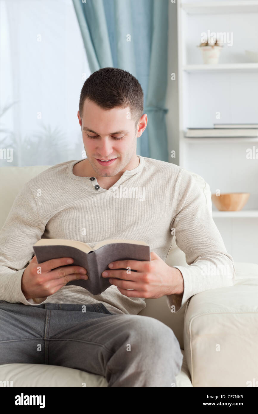 Portrait of a man reading a book Stock Photo - Alamy