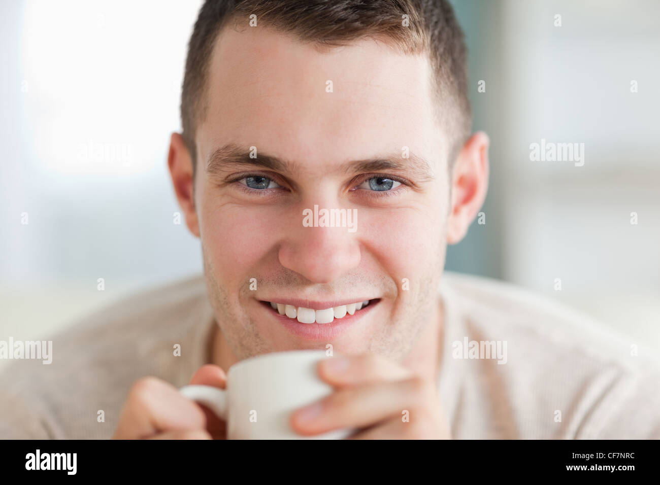 Close up of a man having a tea Stock Photo - Alamy
