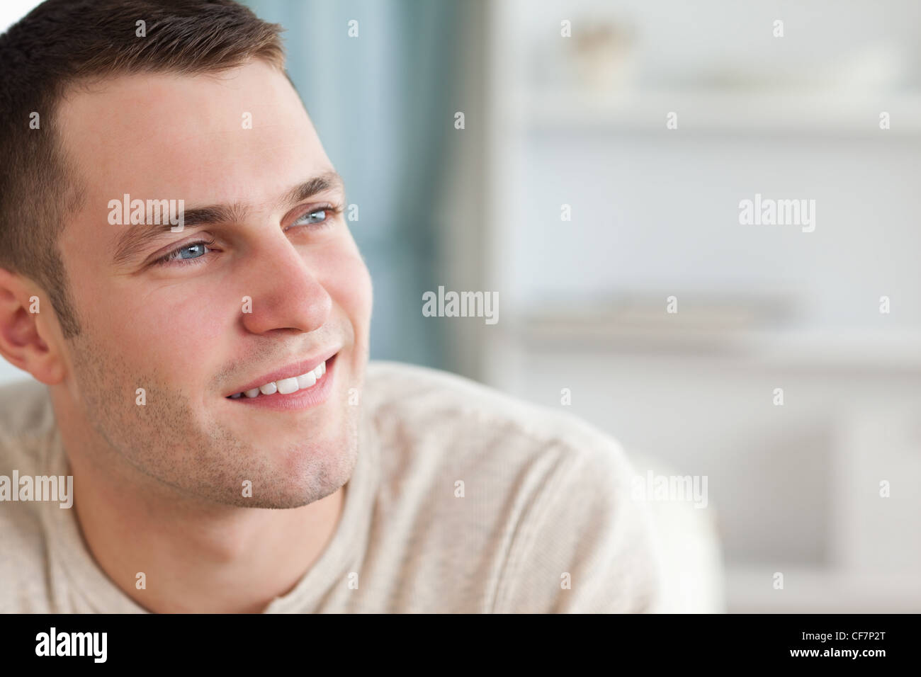 Smiling man posing Stock Photo - Alamy
