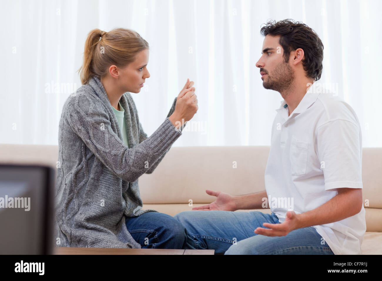 Angry couple arguing Stock Photo - Alamy
