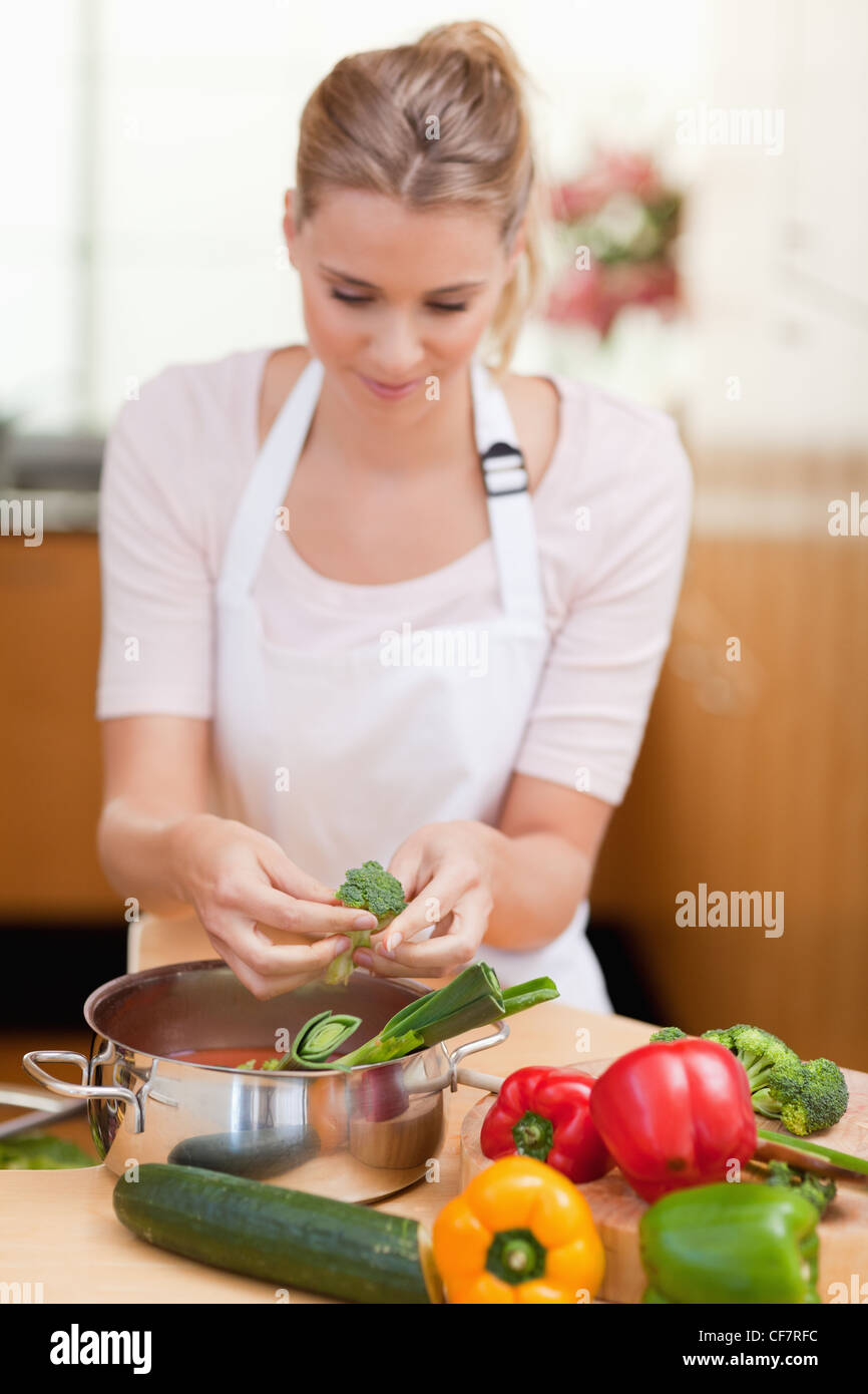 Portrait of a woman cooking Stock Photo - Alamy