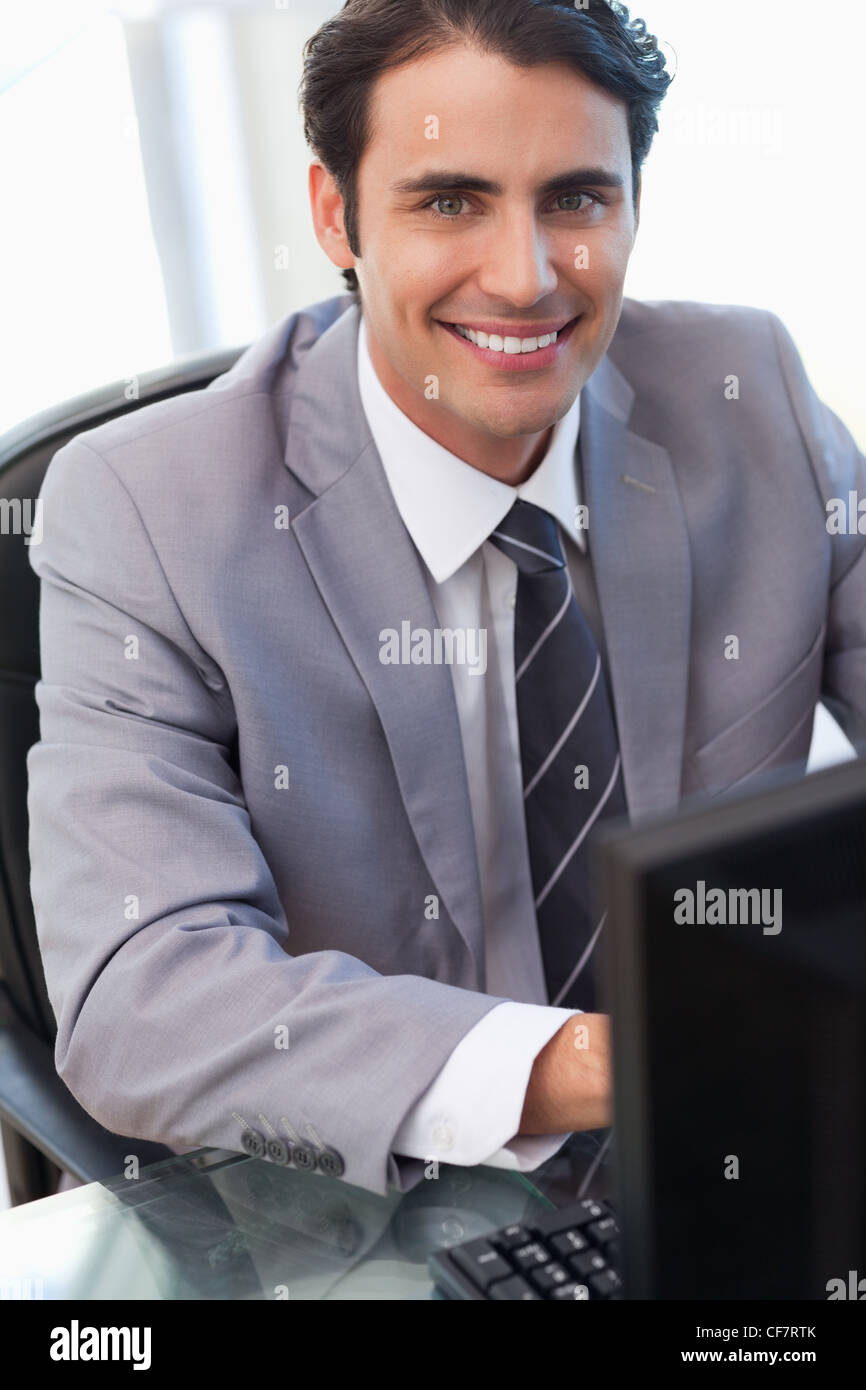 Portrait of a businessman working with a computer Stock Photo - Alamy