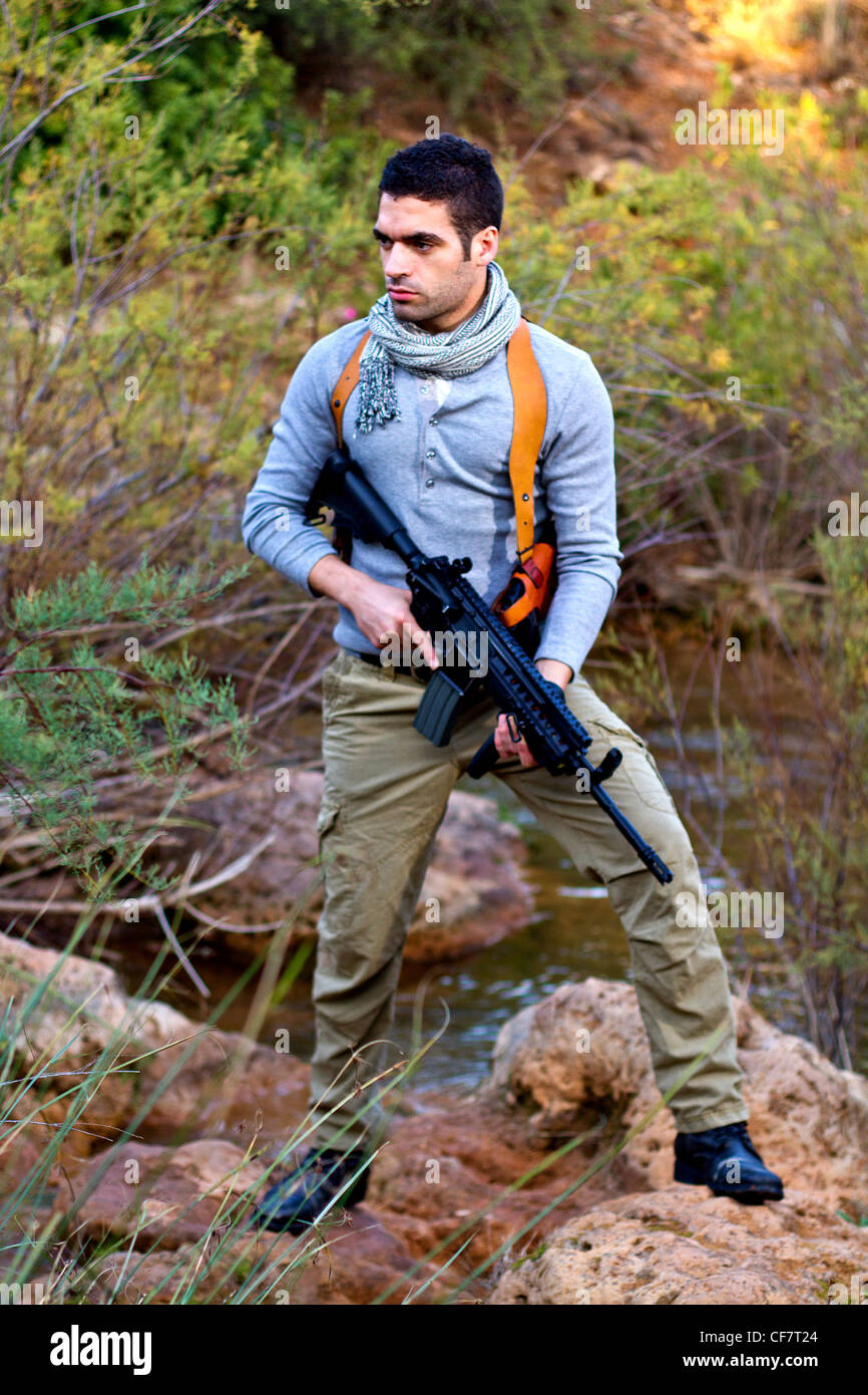 View of an treasure hunter, jungle adventurer type man Stock Photo - Alamy