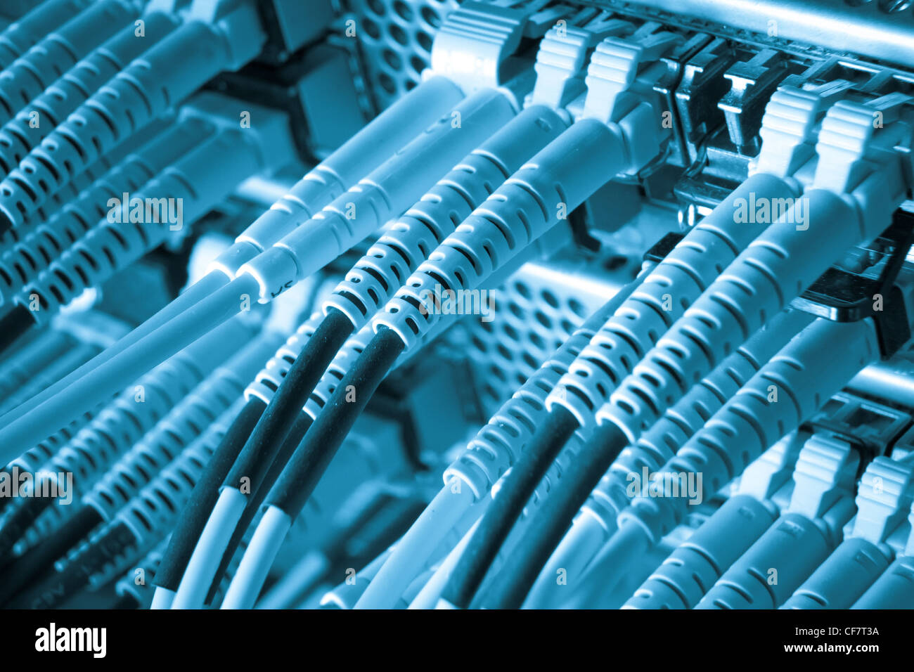 optic fiber cables connected to hub Stock Photo - Alamy