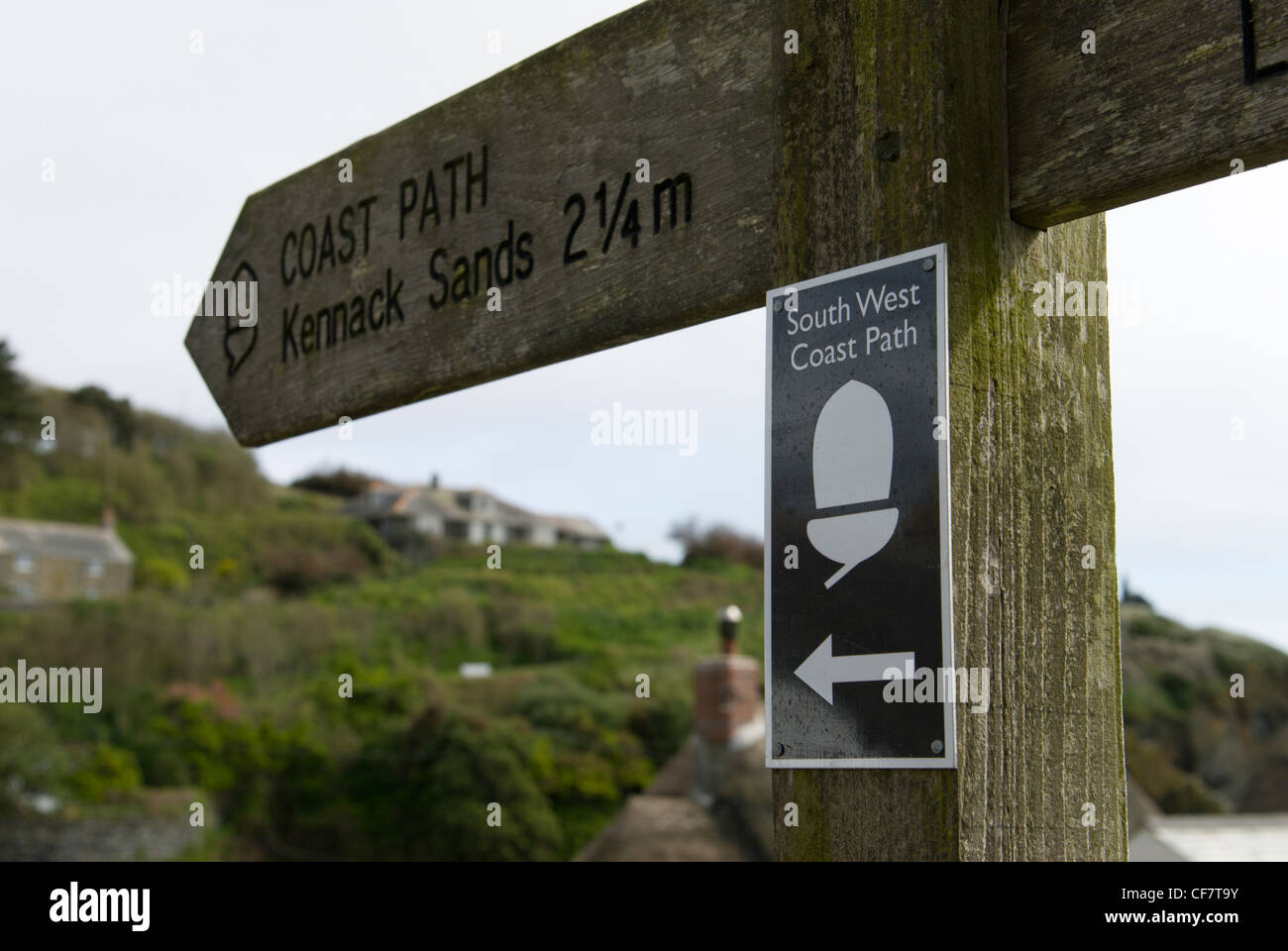 South West Coast Path signage and finger post points the way to Kennack ...