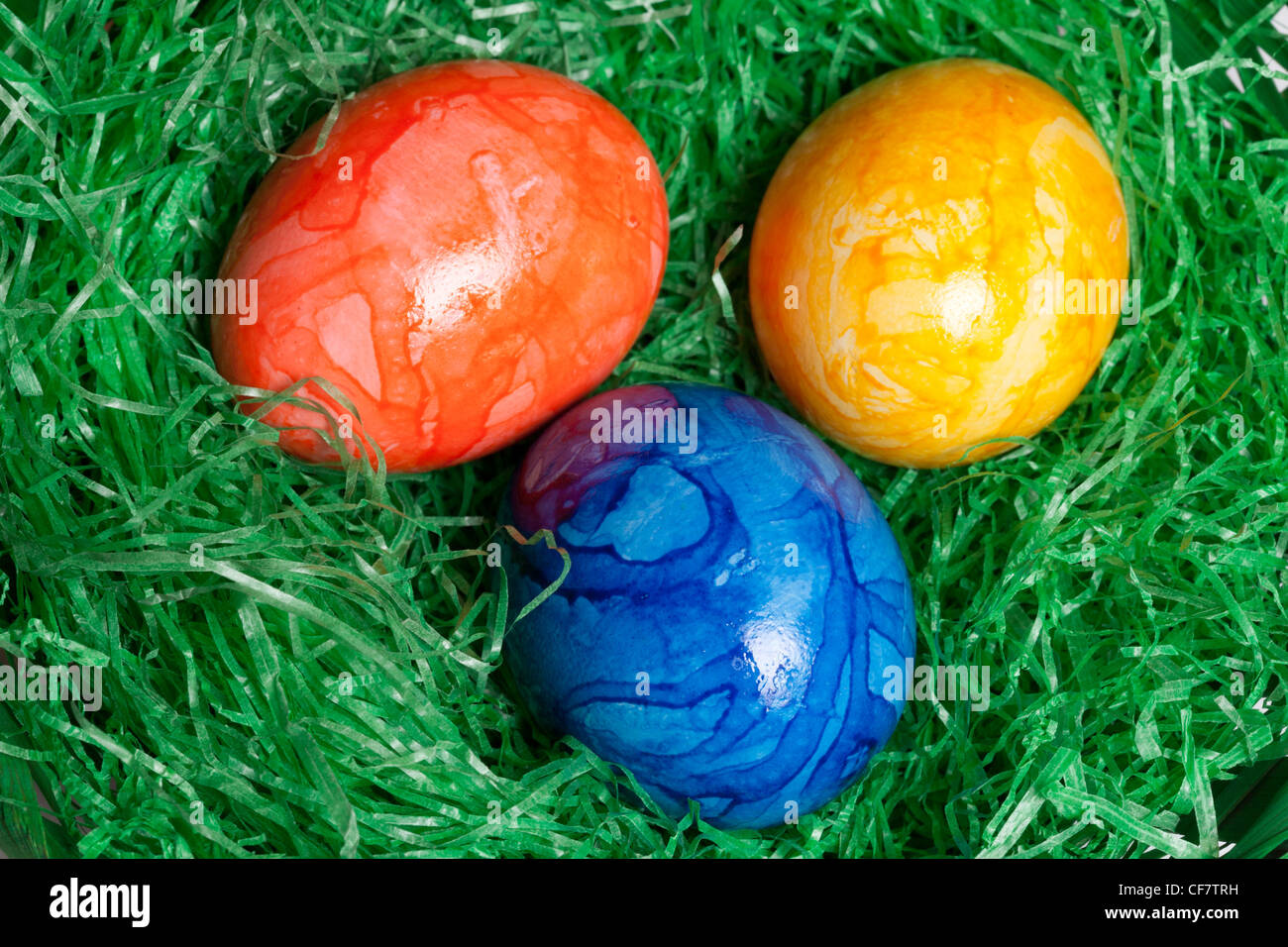 Three colored eggs Stock Photo - Alamy