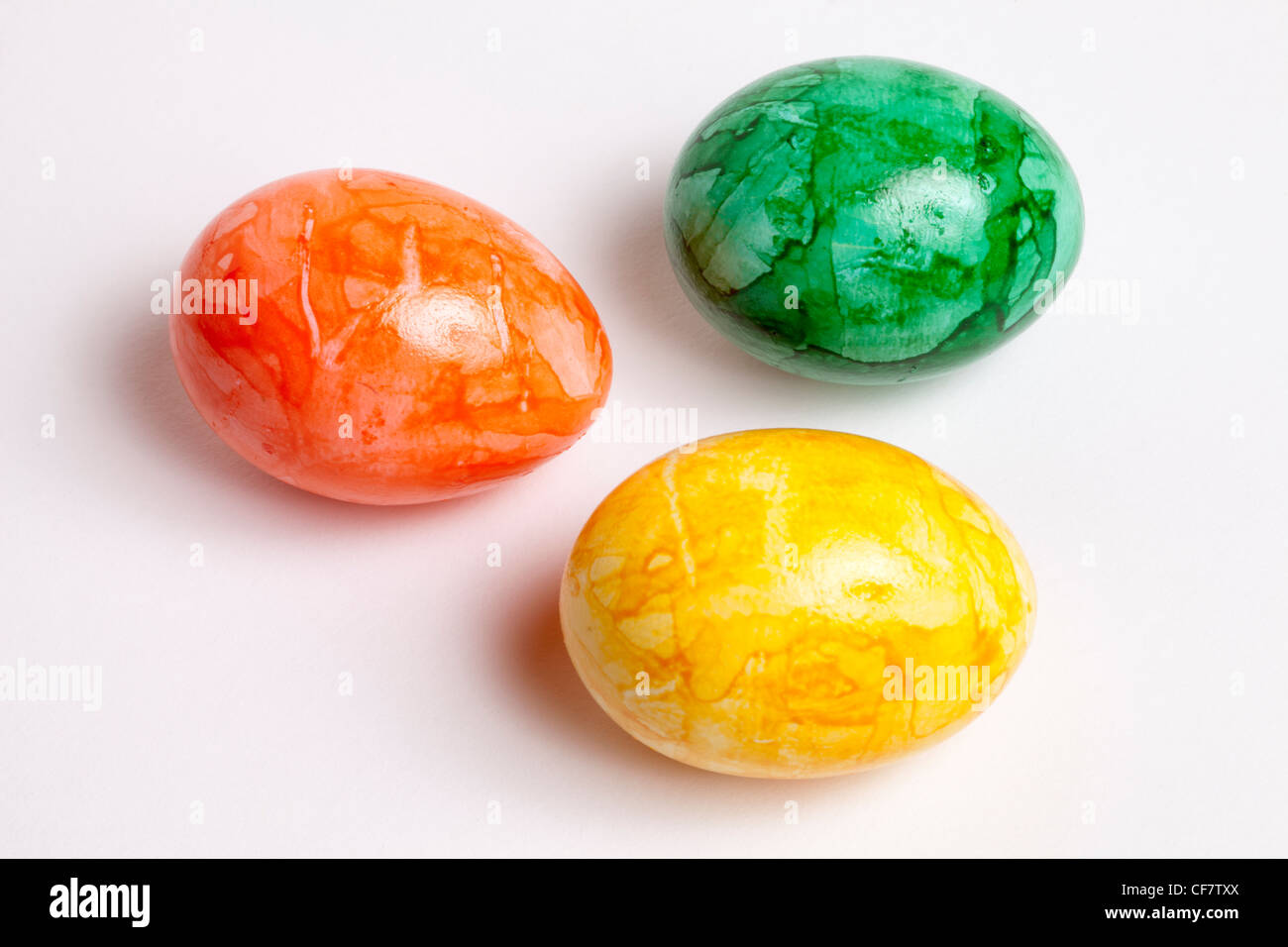 Three colored eggs Stock Photo - Alamy