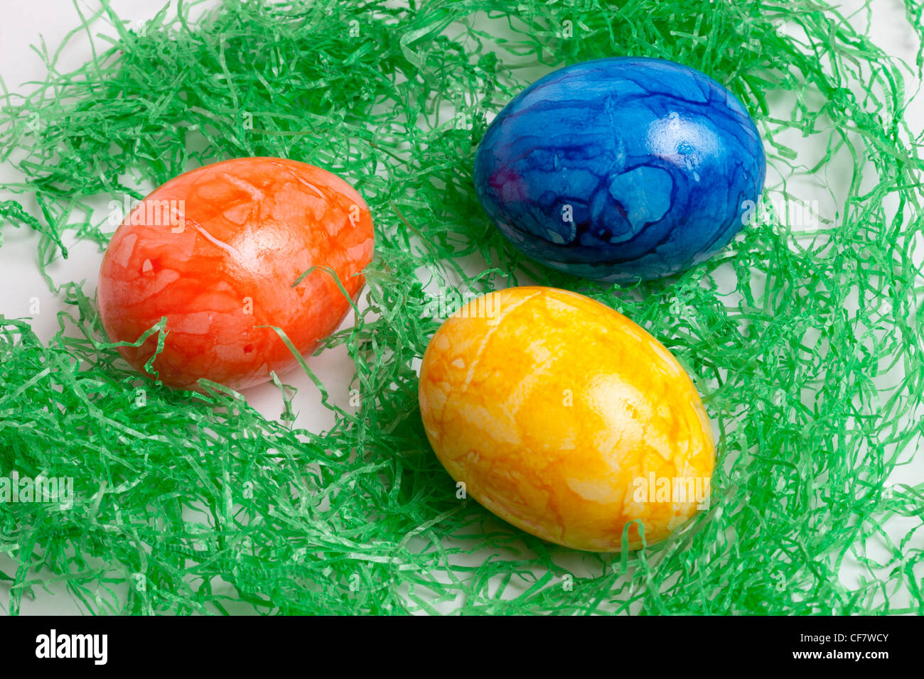 Three colored eggs Stock Photo - Alamy