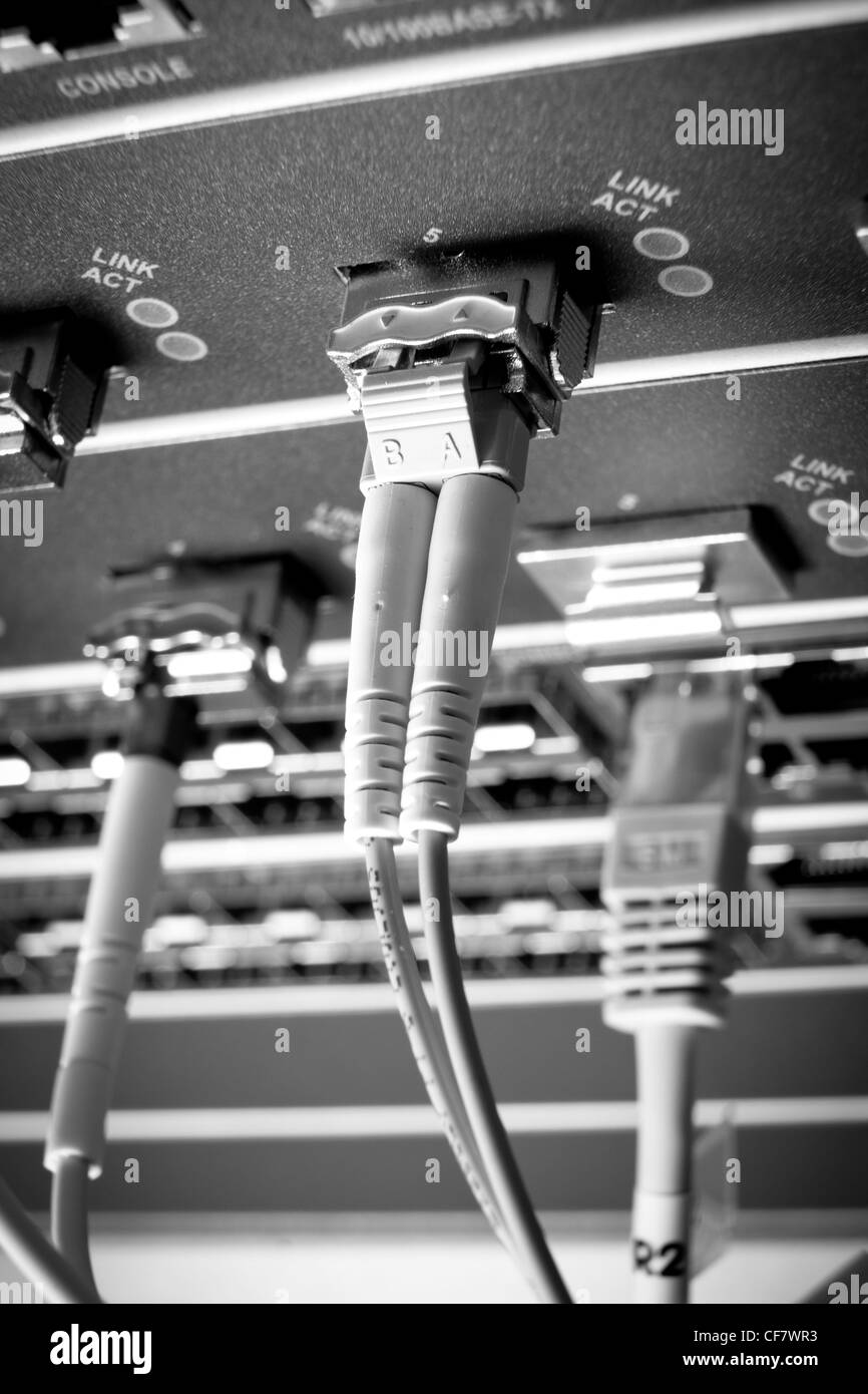 optic fiber cables connected to data center Stock Photo - Alamy