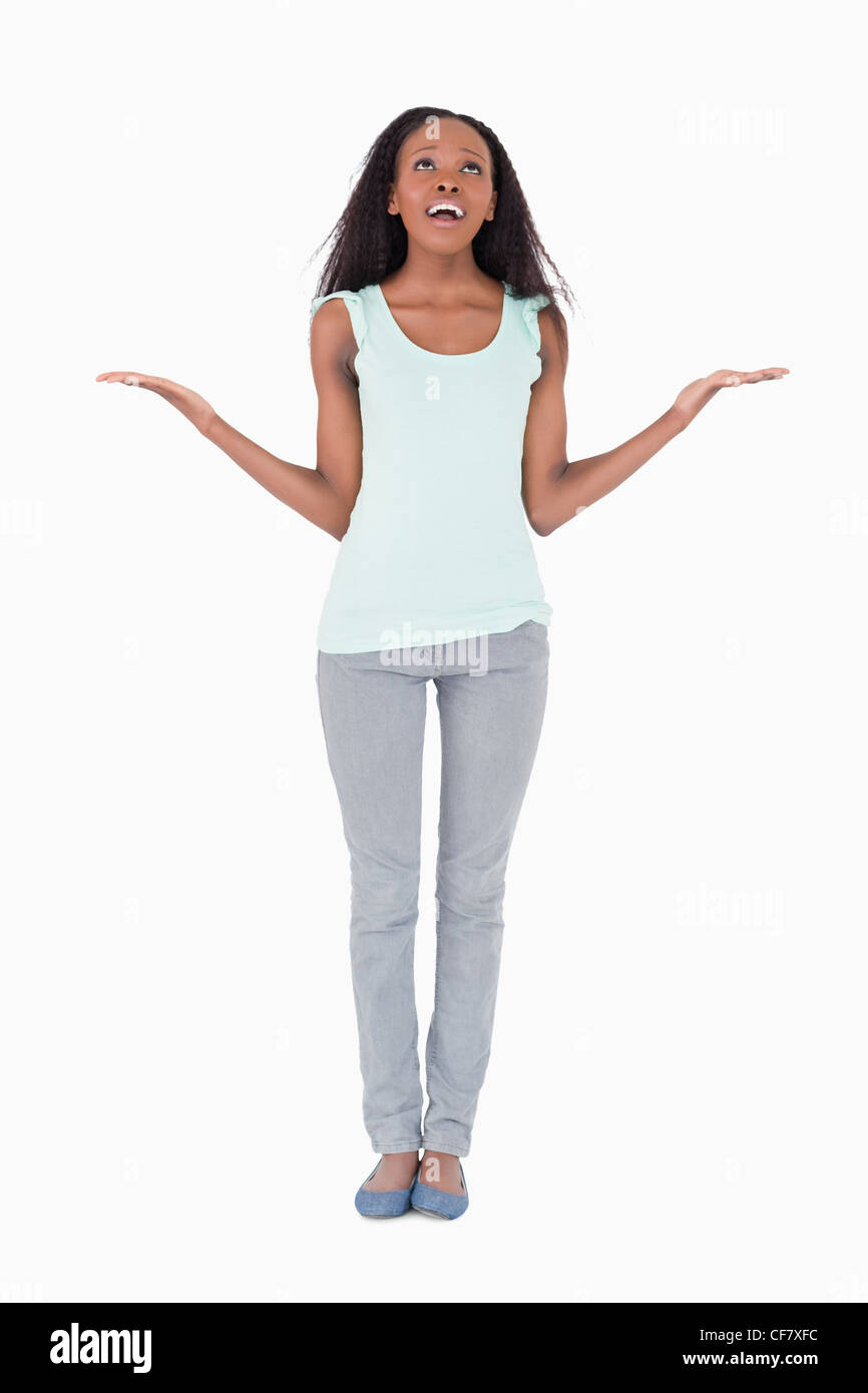 Desperate woman asking for help from above on white background Stock ...