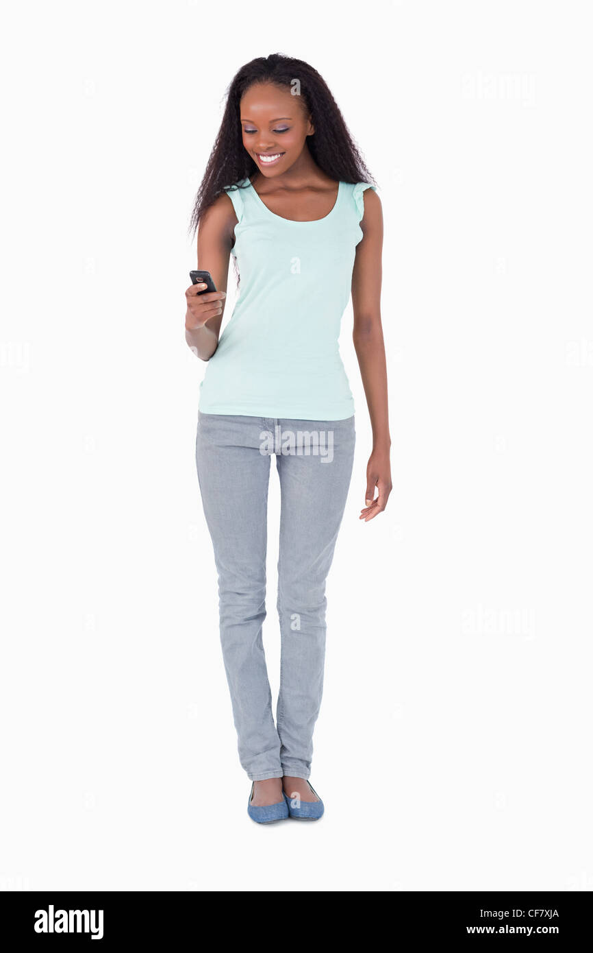 Happy black woman smartphone Cut Out Stock Images & Pictures - Alamy