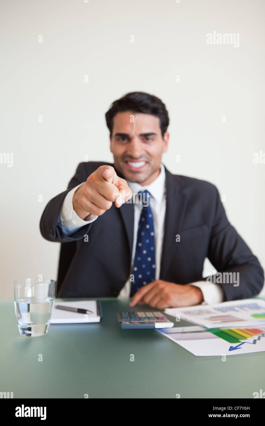 Handsome man pointing viewer hi-res stock photography and images - Alamy