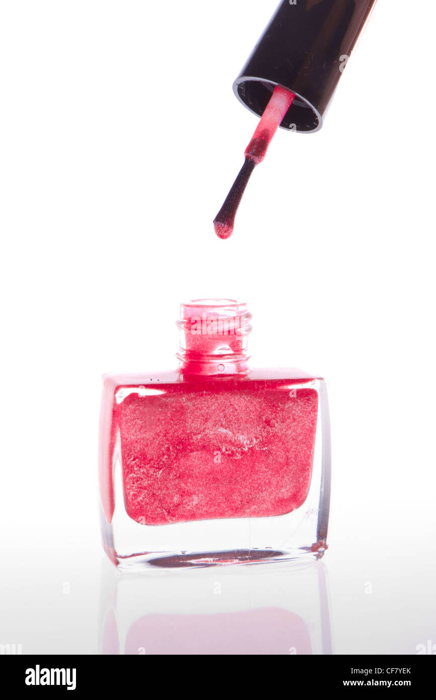 dripping nail polish isolated on white background Stock Photo - Alamy