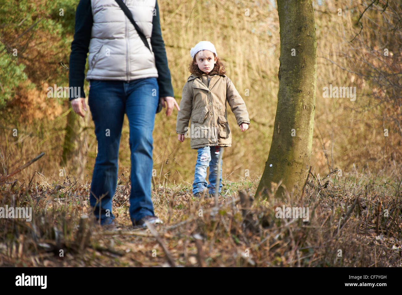 Children playing in autumn forest Stock Photo - Alamy