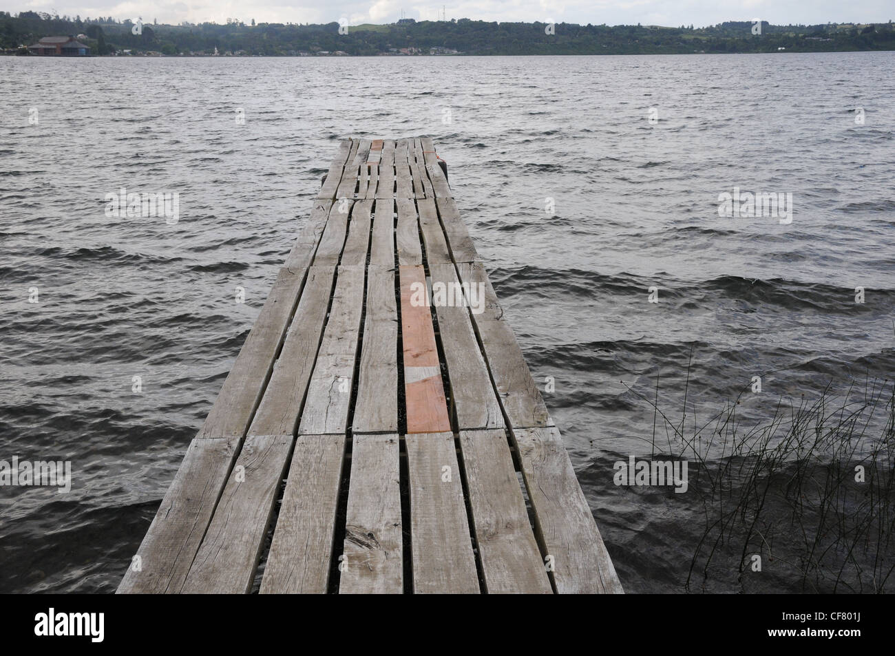 Wooden jetty, choppy water, Lake Llanquihue, Los Lagos region ...