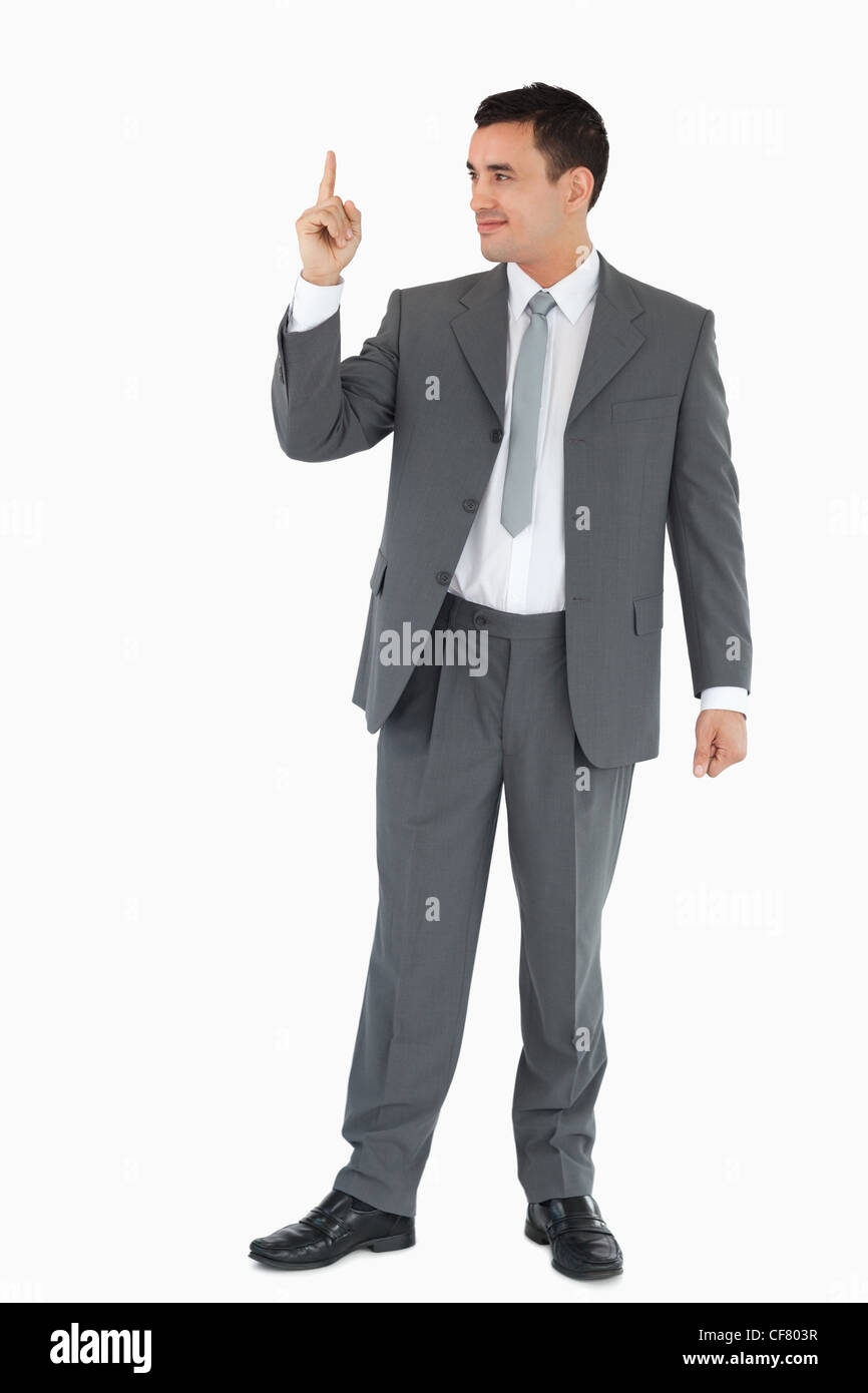 Businessman pointing up Stock Photo - Alamy